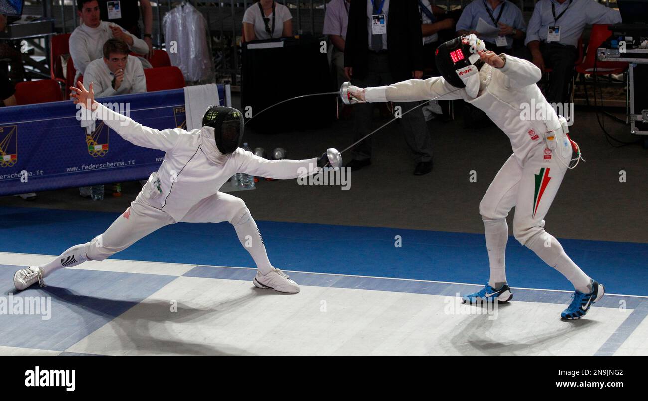 Benjamin Steffen, of Switzerland, left, competes with Gabor Boczko of ...