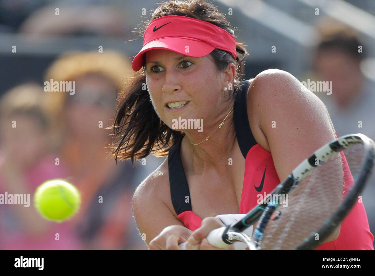 Sofia Arvidsson of Sweden returns in her match against Arantxa Rus of The Netherlands at the ...