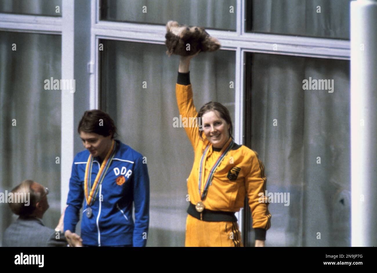 Australia's Michelle Ford holds up a stuffed koala bear toy after ...