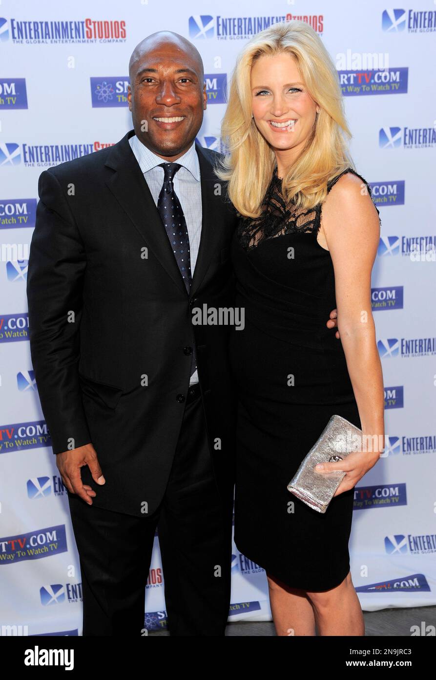 Byron Allen, left, and his wife Jennifer Lucas pose together at the ...