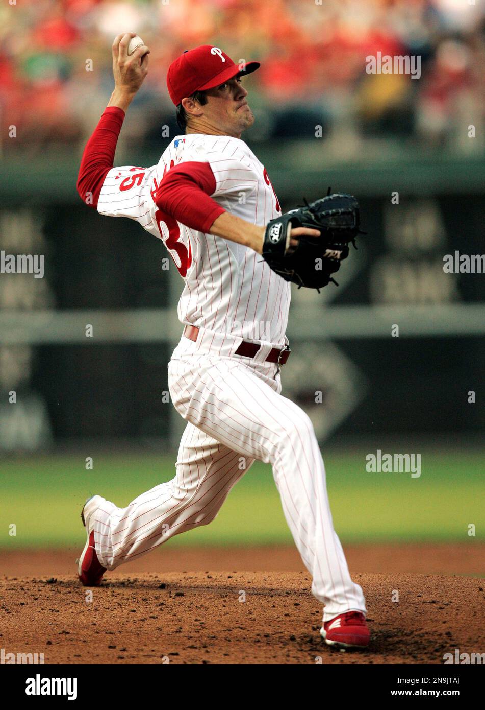 Philadelphia Phillies' Cole Hamels winds up in the second inning of a ...