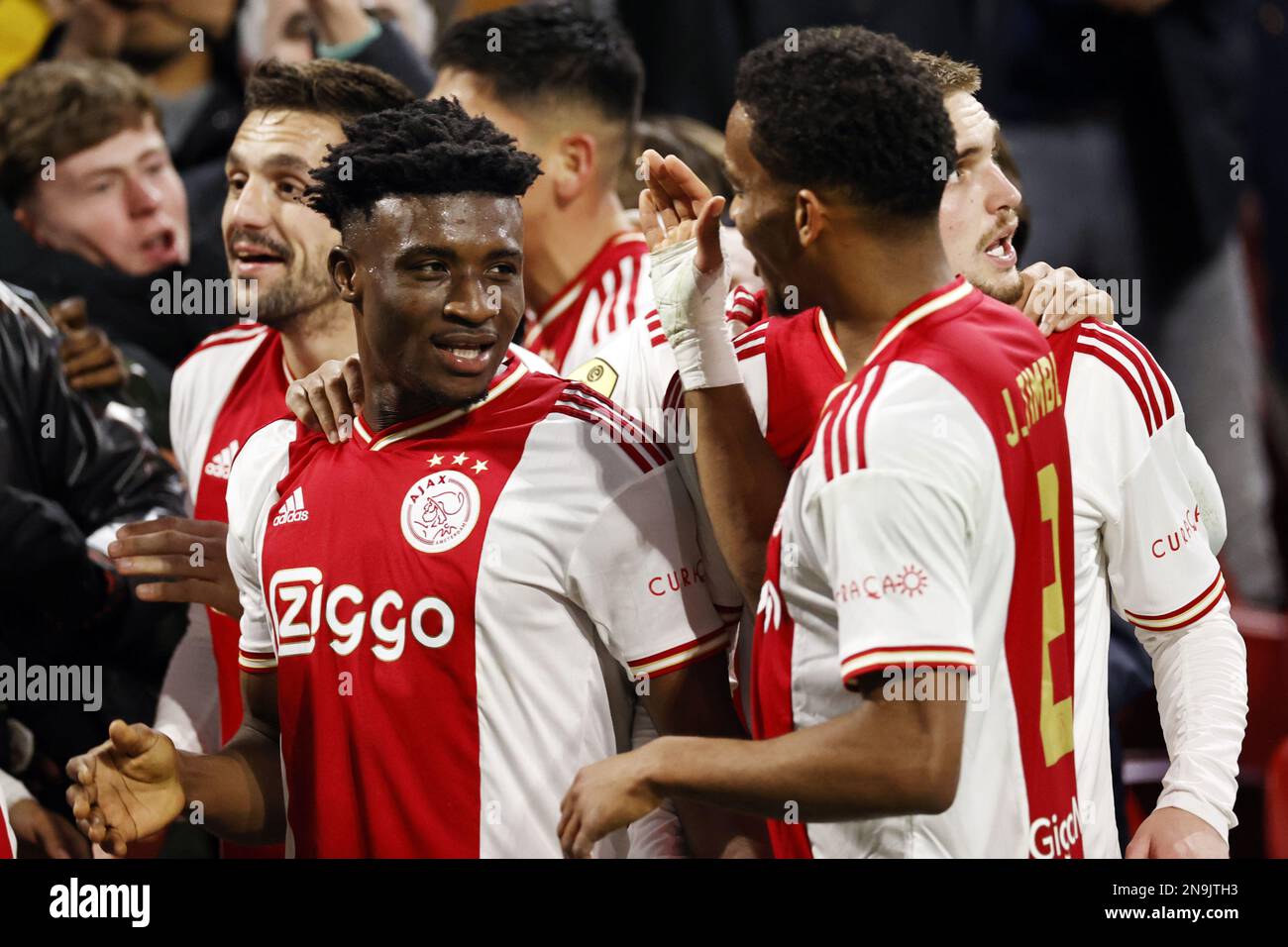 AMSTERDAM - (lr) Mohammed Kudus of Ajax, Jurrien Timber of Ajax celebrate the 3-1 during the ...