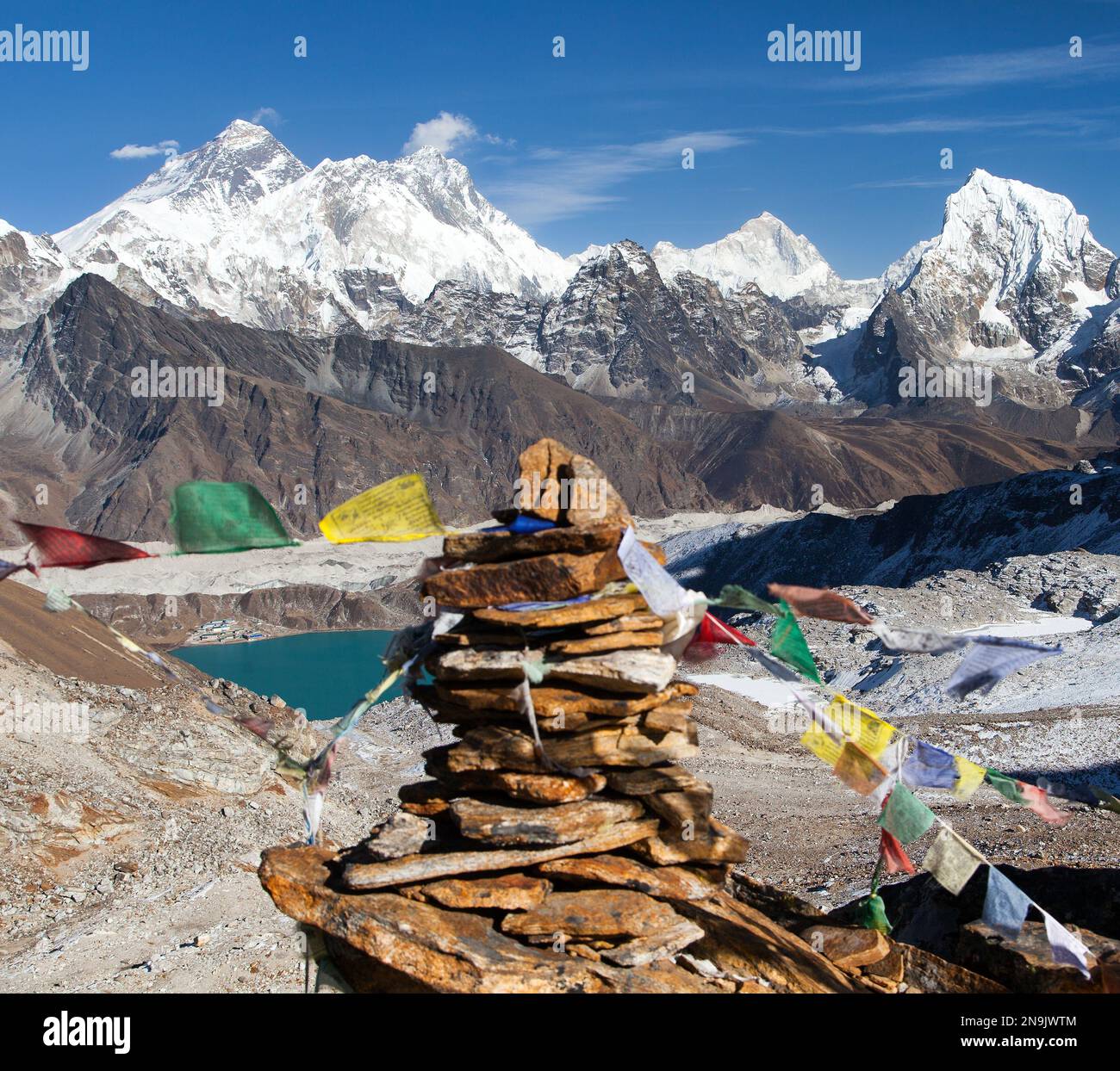 view of Mount Everest, Lhotse and Makalu with buddhist prayer flags ...