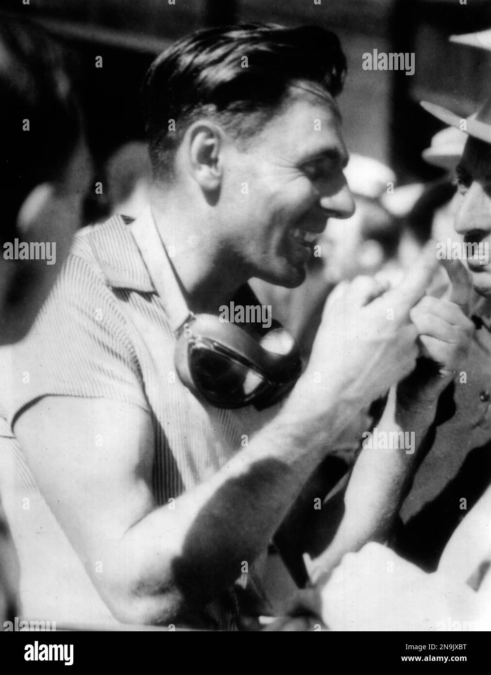 Louis Meyer wears a $21,900 smile of victory after winning the annual ...