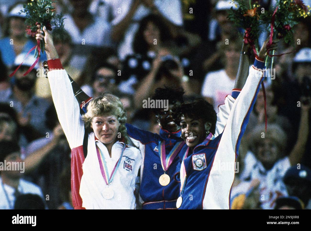 L-R: Britain's Shirley Strong wearing the silver medal (race time 12.88 ...