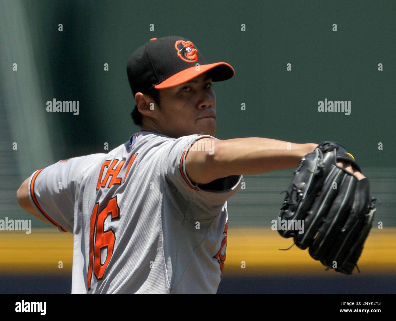Baltimore Orioles pitchers Wei-Yin Chen, of Taiwan, plays in a baseball ...