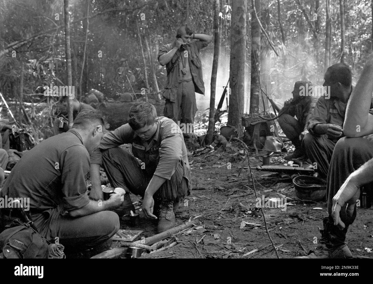 Men of the U.S. 25th Infantry Division have a chess game with their ...