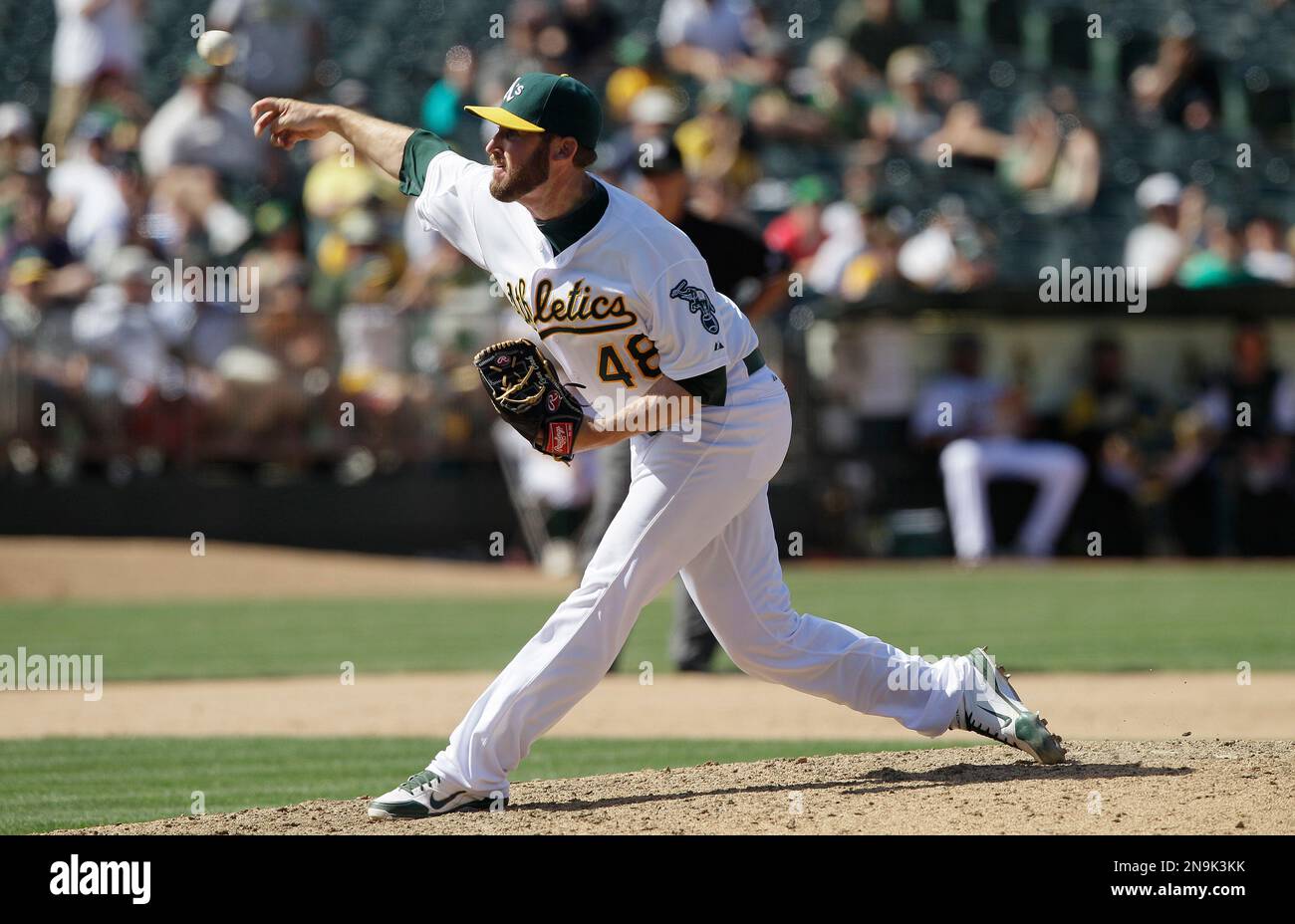 Oakland Athletics pitcher Ryan Cook (48) delivers a pitch against the ...