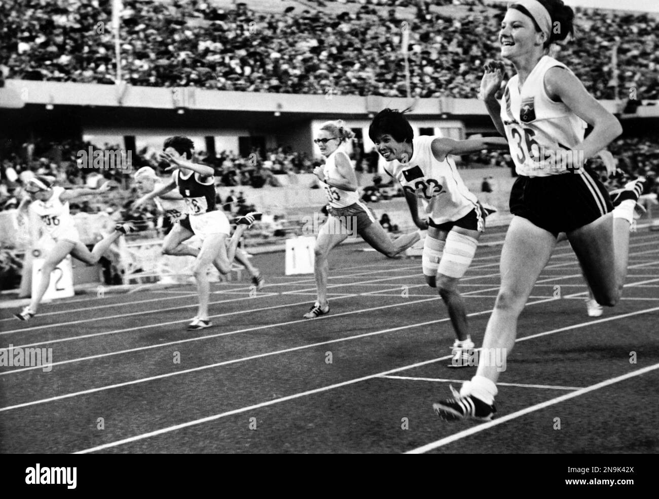 Australia's Maureen Caird (number 36), far right, wins the final of the ...