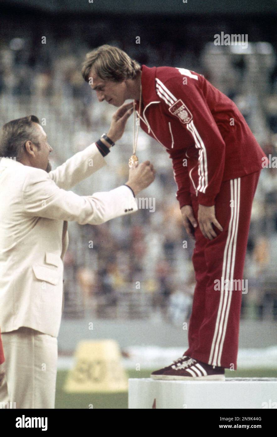 Poland's Tadeusz Slusarski receives the gold medal for winning the Men ...