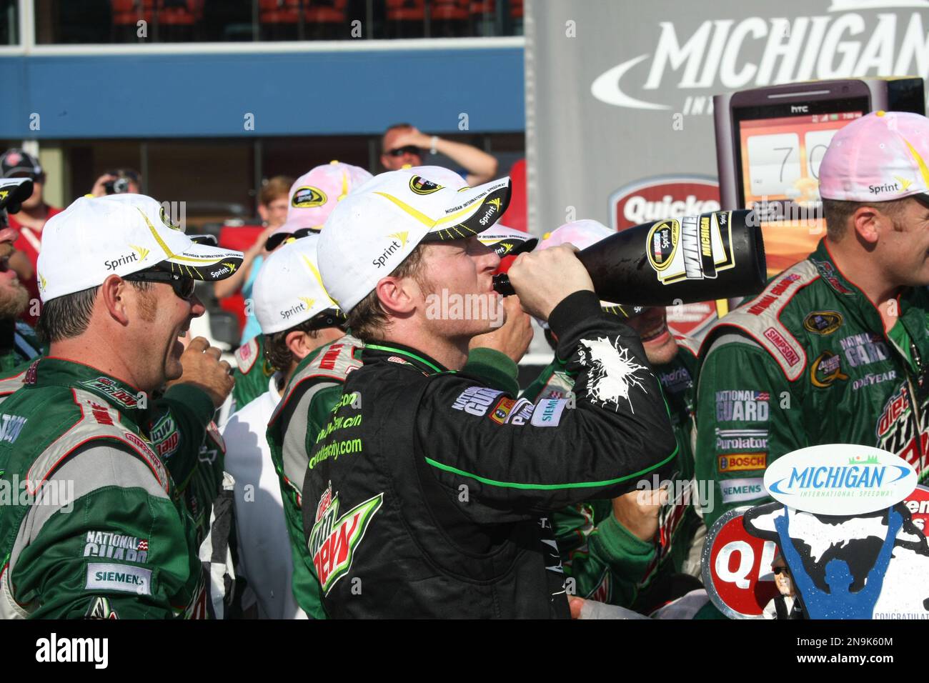 NASCAR driver Dale Earnhardt Jr., takes a drink of champagne after ...