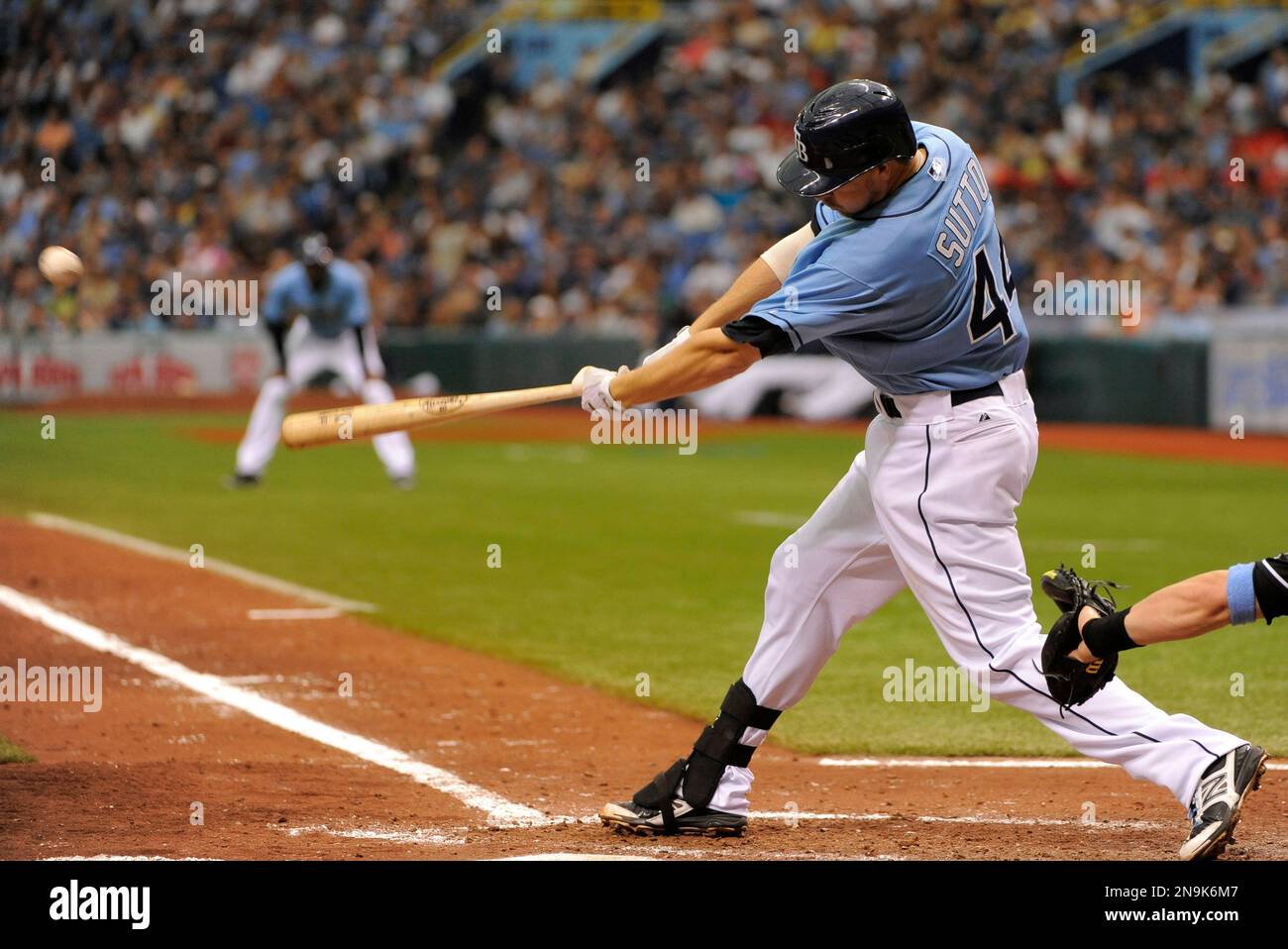 Tampa Bay Rays' Drew Sutton hits a one-run single off of Miami Marlins ...