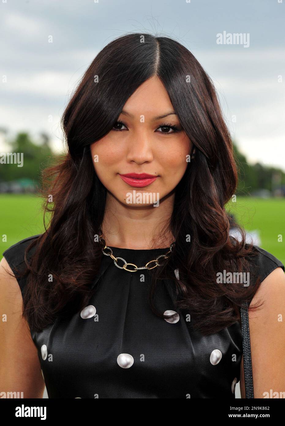 Gemma Chan arrives at the Cartier Queen's Cup 2012 at Guards Polo Club ...