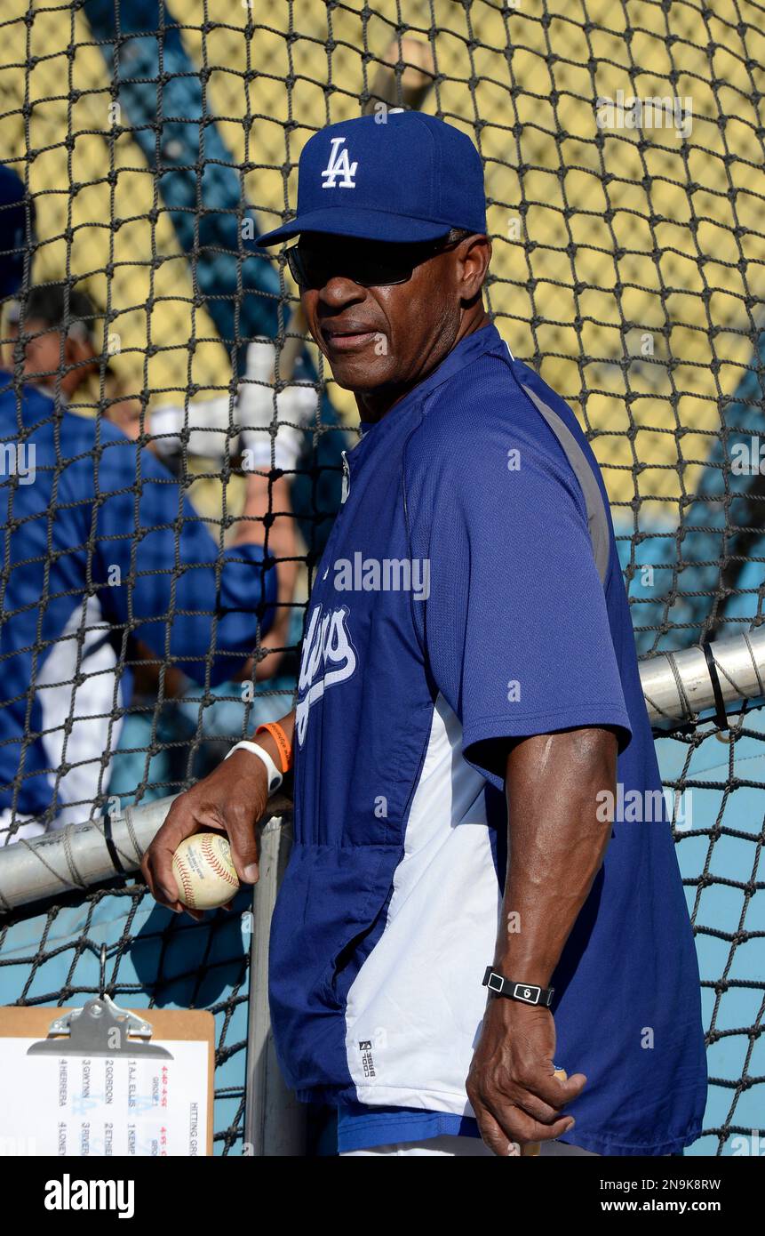 Los Angeles Dodgers coach Manny Mota looks on during batting practice ...