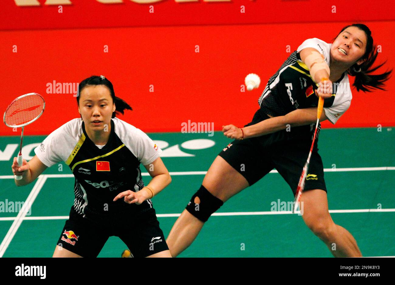 China's Zhao Yunlei, right, returns a shot to her compatriot pair of ...