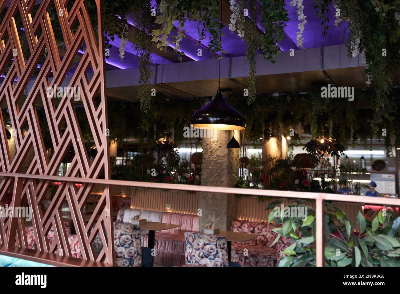 Semi-illuminated loft-style restaurant. Restaurant interior, top view ...