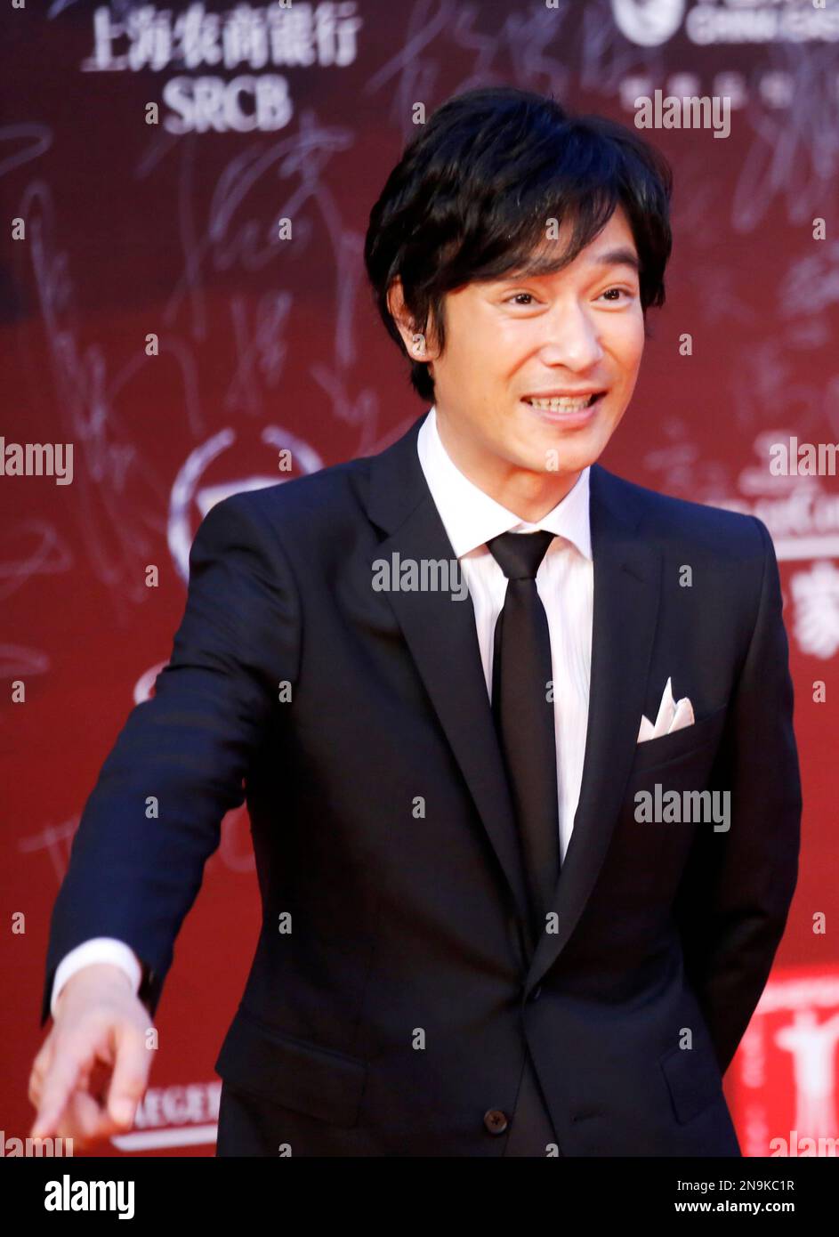 CORRECTS YEAR - Japanese actor Masato Sakai gestures on the red carpet ...