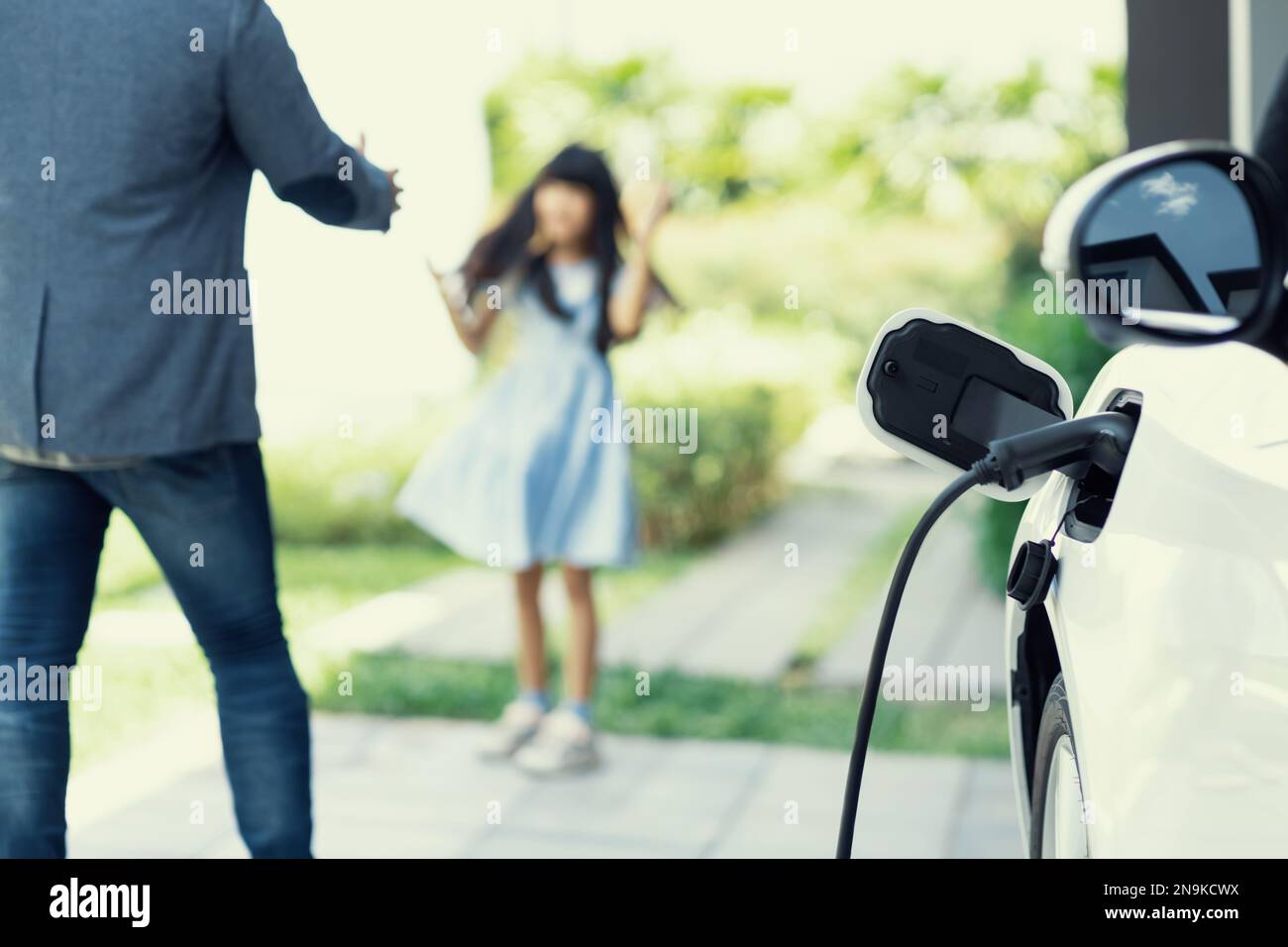 Hybrid cars charging at home hi-res stock photography and images - Alamy