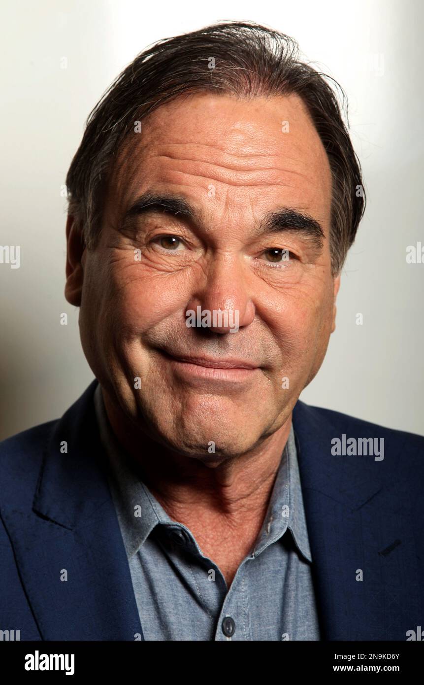 Director Oliver Stone, from the upcoming film "Savages", poses for a ...