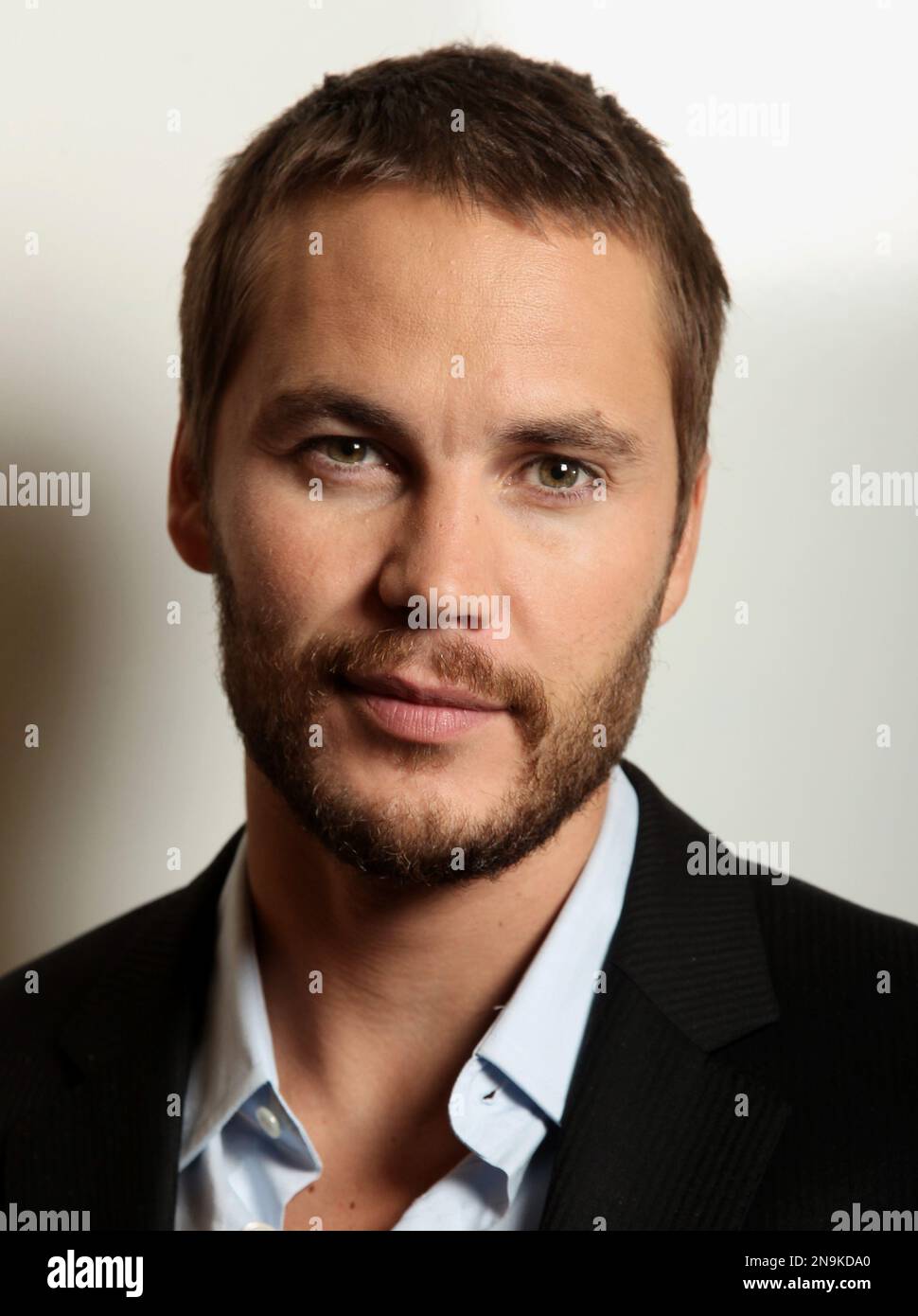 Actor Taylor Kitsch, from the upcoming film "Savages", poses for a ...