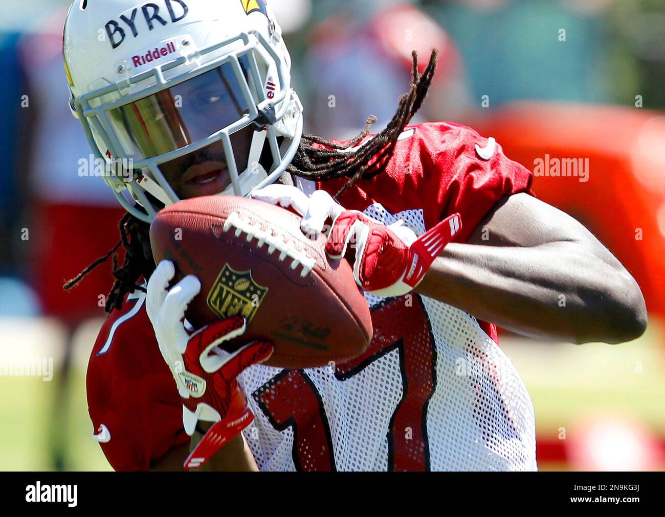 Arizona Cardinals' LaRon Byrd (17) makes a catch during minicamp NFL ...