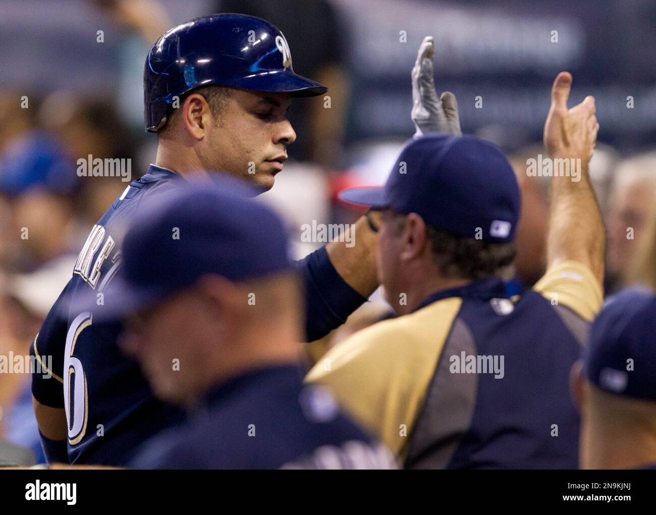 Milwaukee Brewers' Aramis Ramirez is congratulated by teammates ...