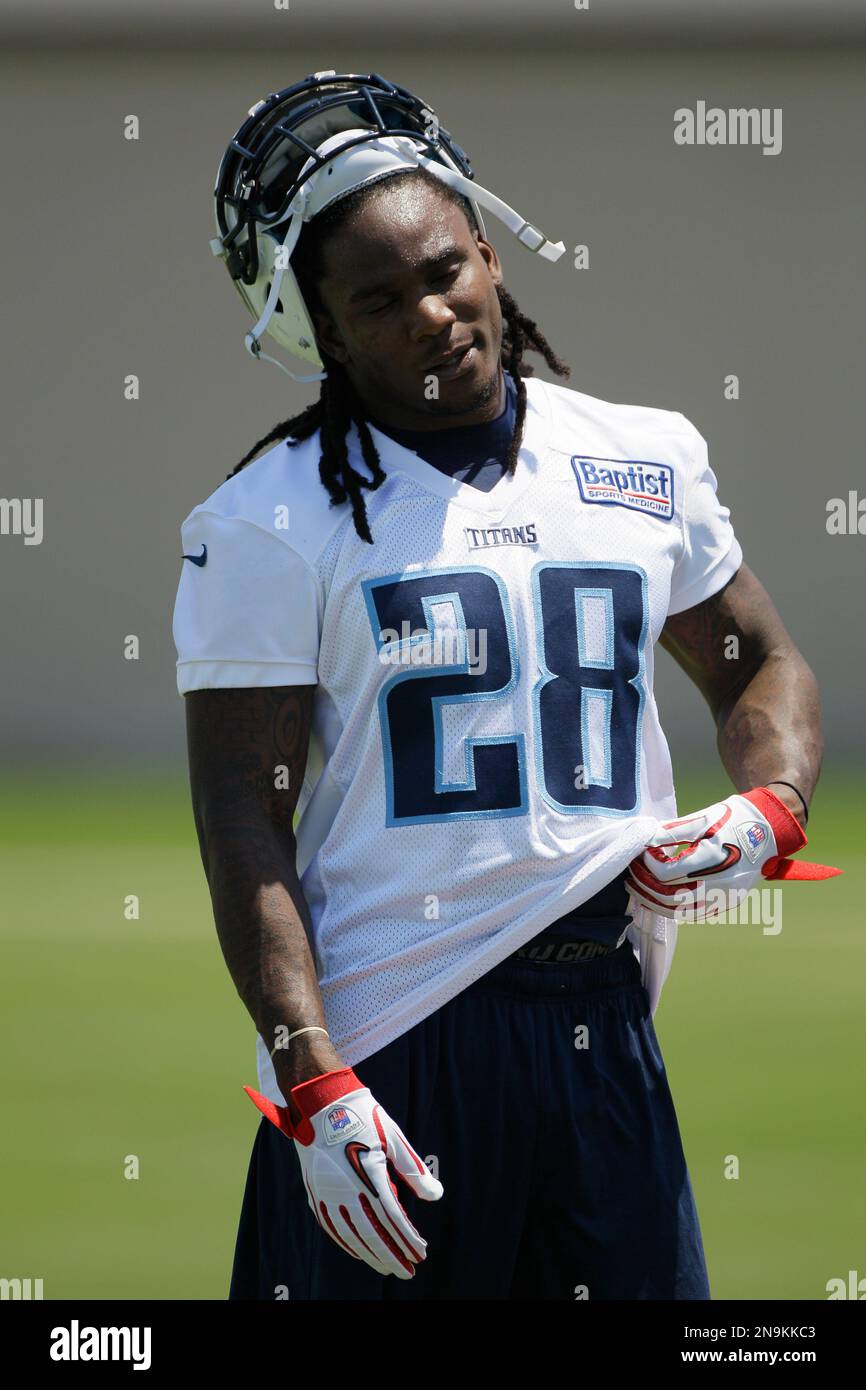 Tennessee Titans running back Chris Johnson takes a break during NFL ...