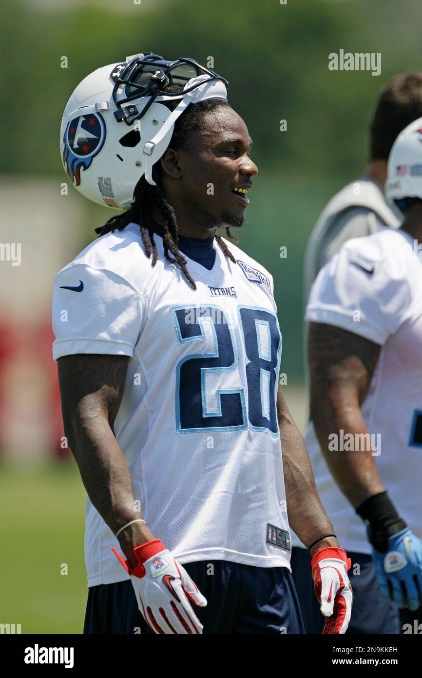 Tennessee Titans running back Chris Johnson takes a break during NFL ...