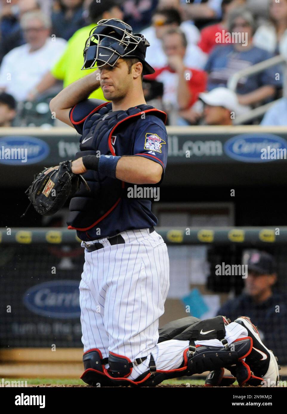 Minnesota Twins catcher Joe Mauer is shown during a baseball game ...