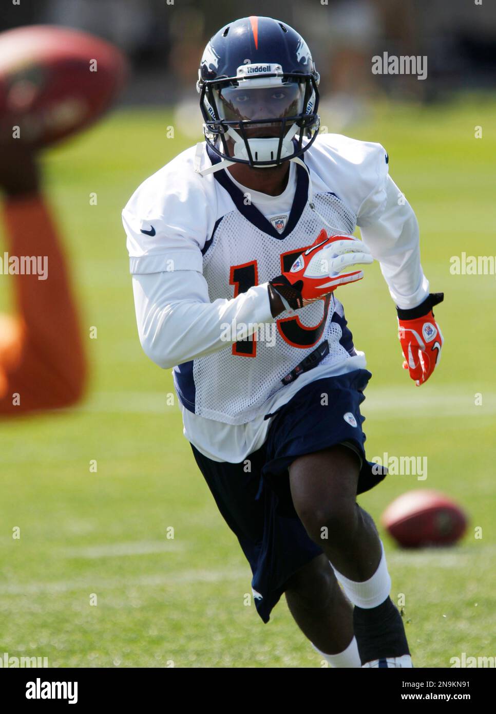 Denver Broncos wide receiver Mark Dell takes parts in pasing drills ...