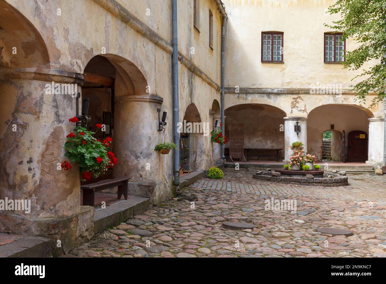 Autumn in medieval convent yard in old European town. Jaunpils, Latvia ...