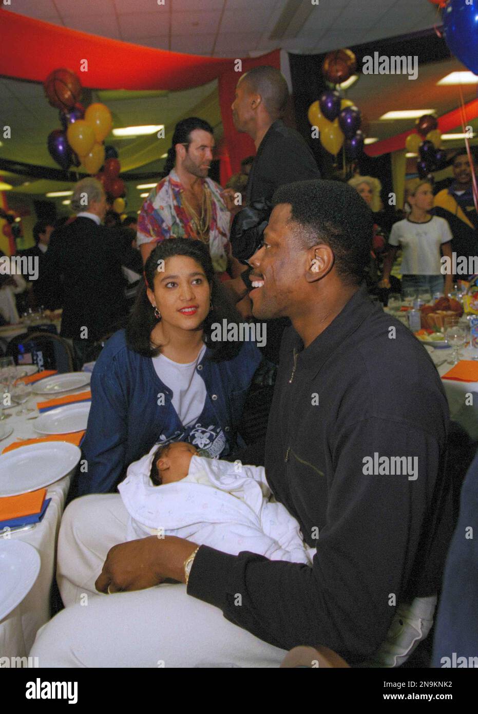 New York Knicks center Patrick Ewing sits with his wife Rita and their ...