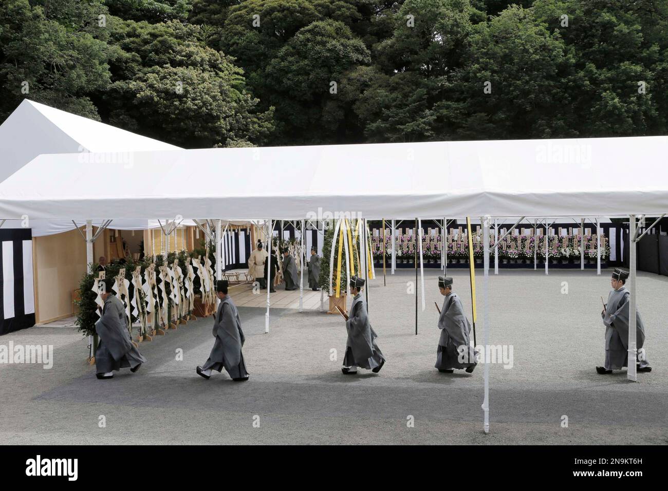 Shinto priests arrive for a funeral for the late Prince Tomohito, a ...