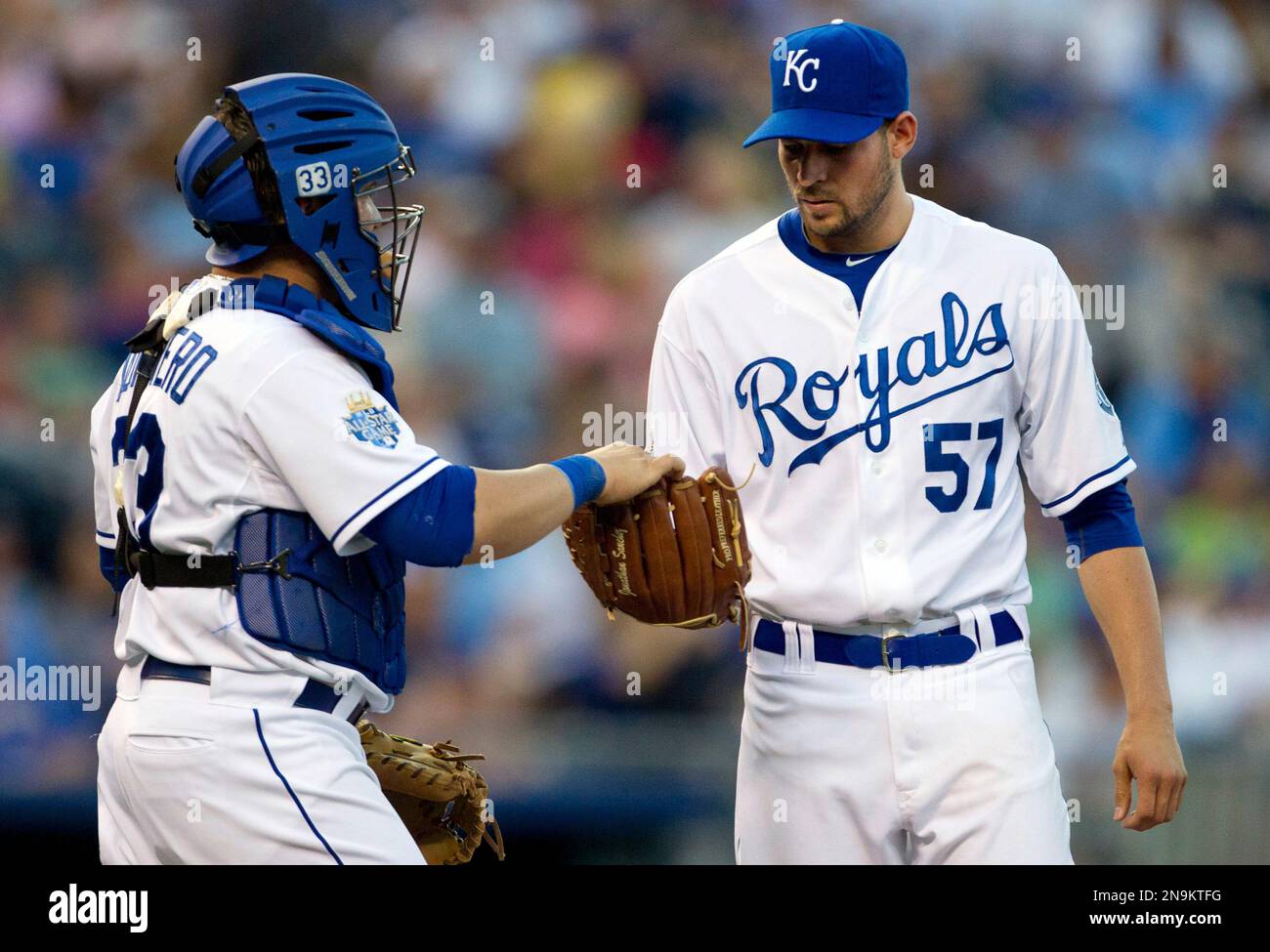Kansas City Royals starting pitcher Jonathan Sanchez (57) meets with ...