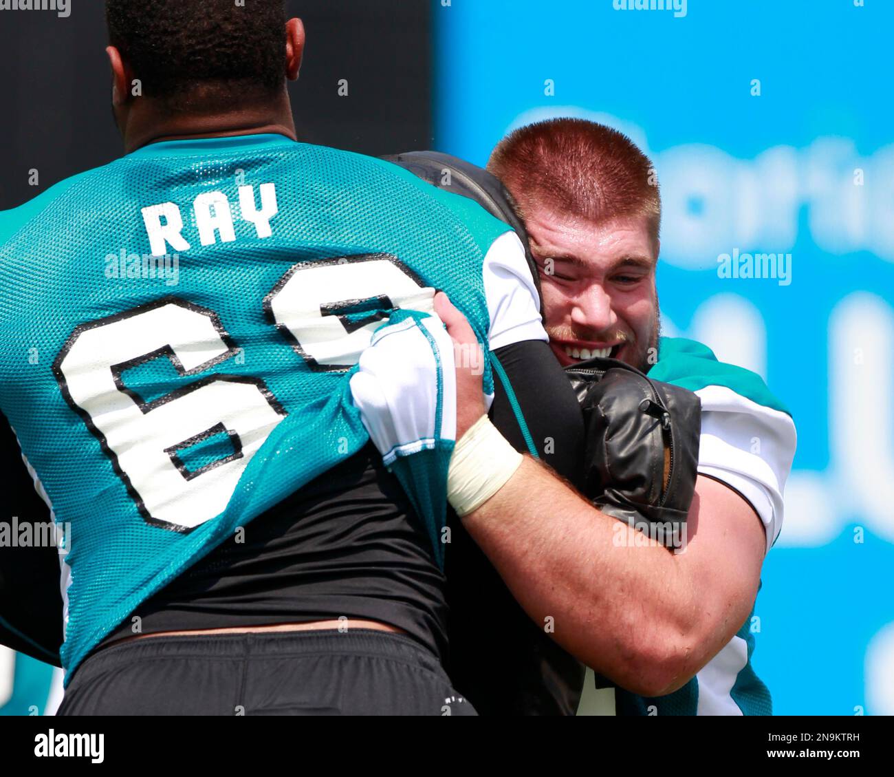 Jacksonville Jaguars defensive tackle Drew Nowak, right, and defensive ...