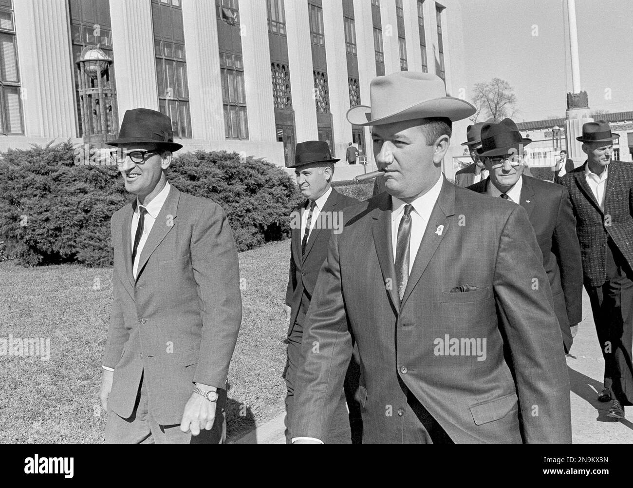 Neshoba County Deputy Sheriff Cecil Price puffs a cigar and wears a ...