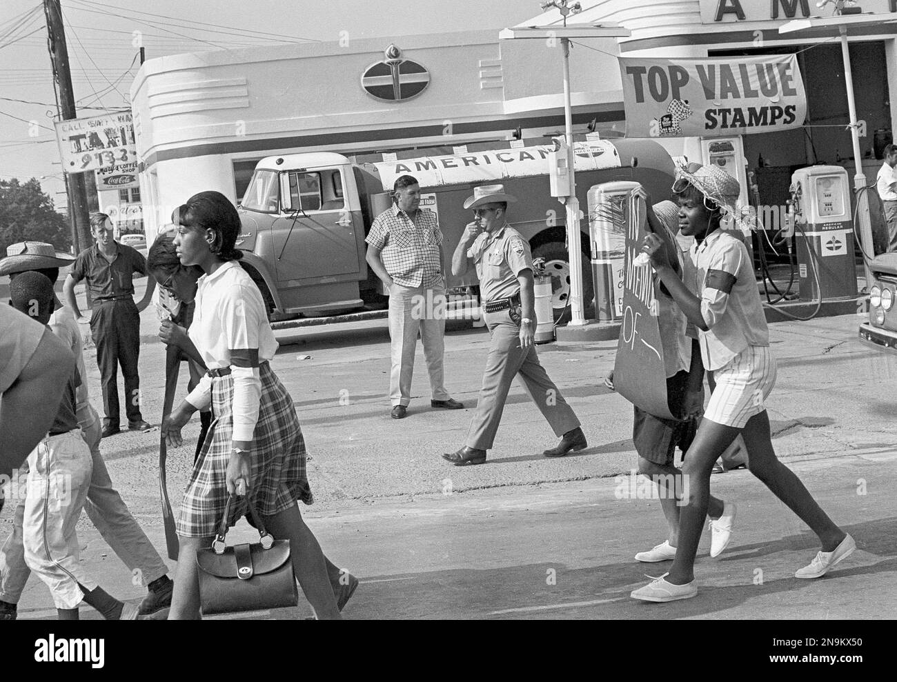 Neshoba County Deputy Sheriff Cecil Price, left, appears to be keeping ...