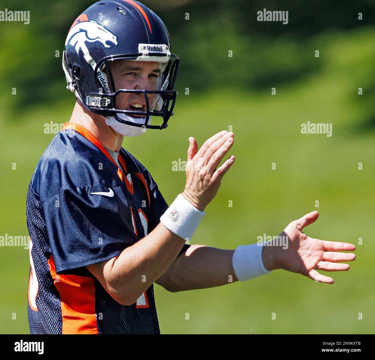 Denver Broncos quarterback Peyton Manning encourages teammates during ...