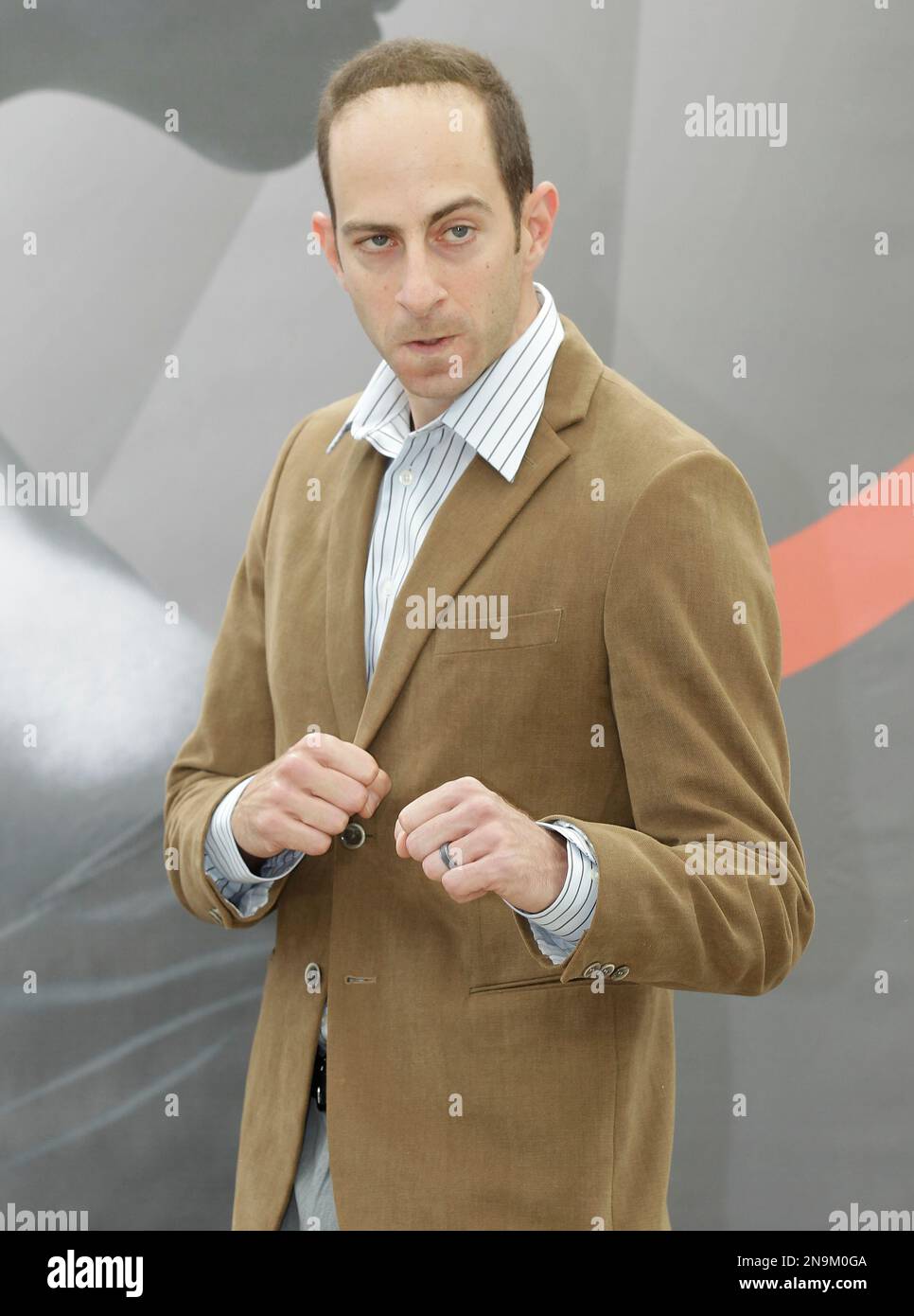 Canadian actor Ernie Grunwald poses during a photocall at the 2012 ...