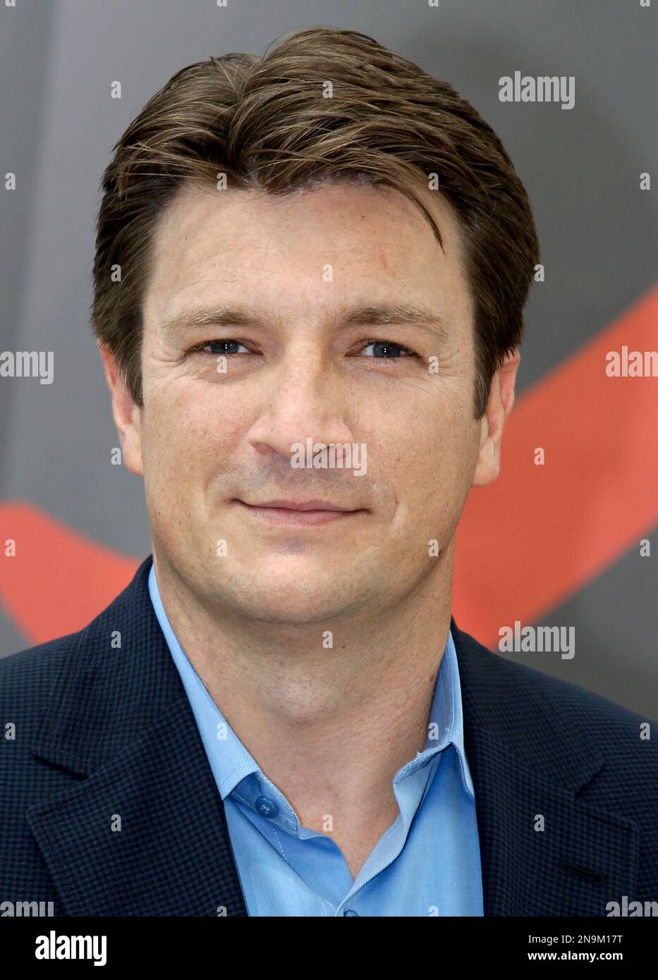 Canadian actor Nathan Fillion poses during a photocall at the 2012 ...