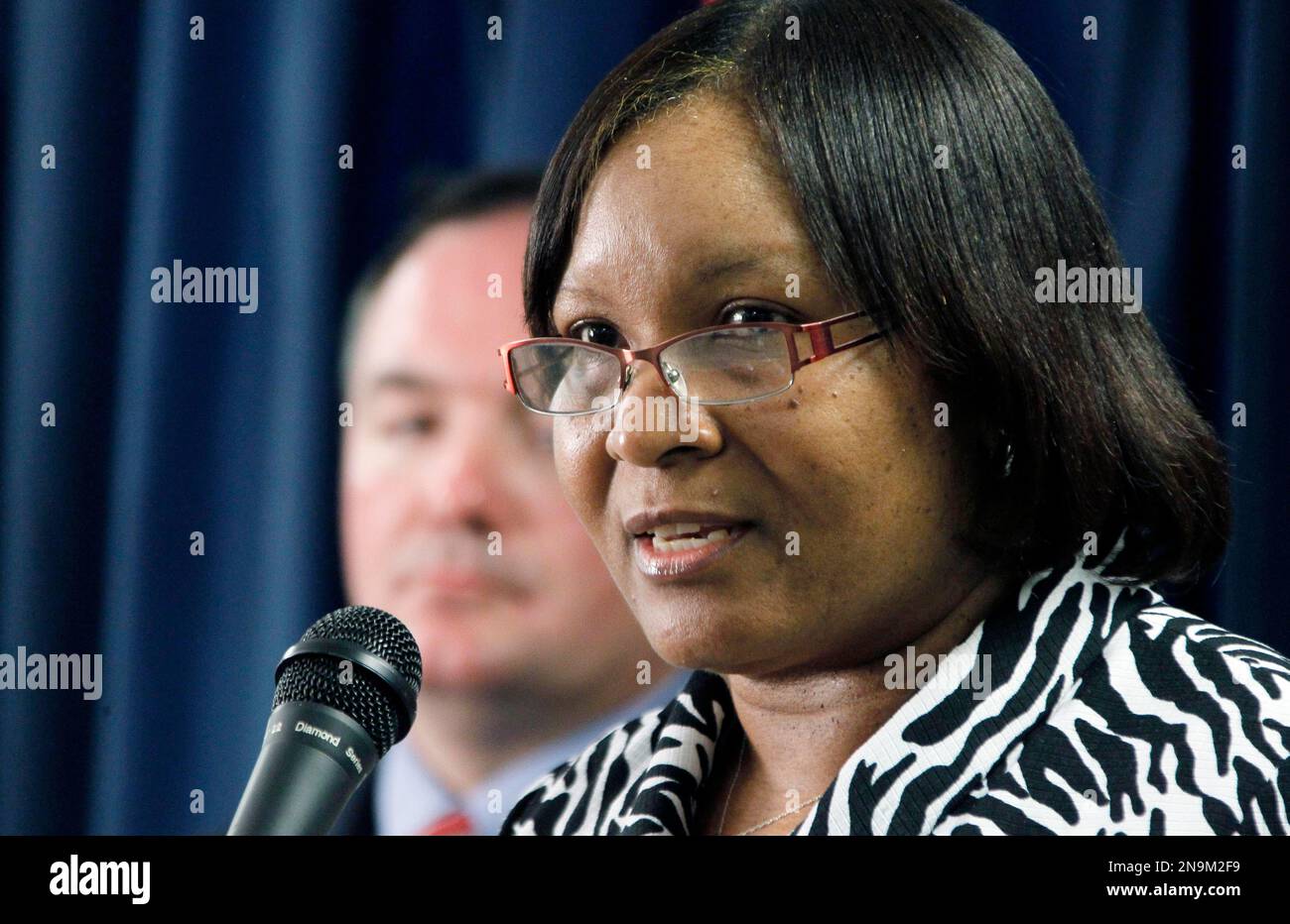 Victim Services Director Dillworth Ricks reads a statement made by ...