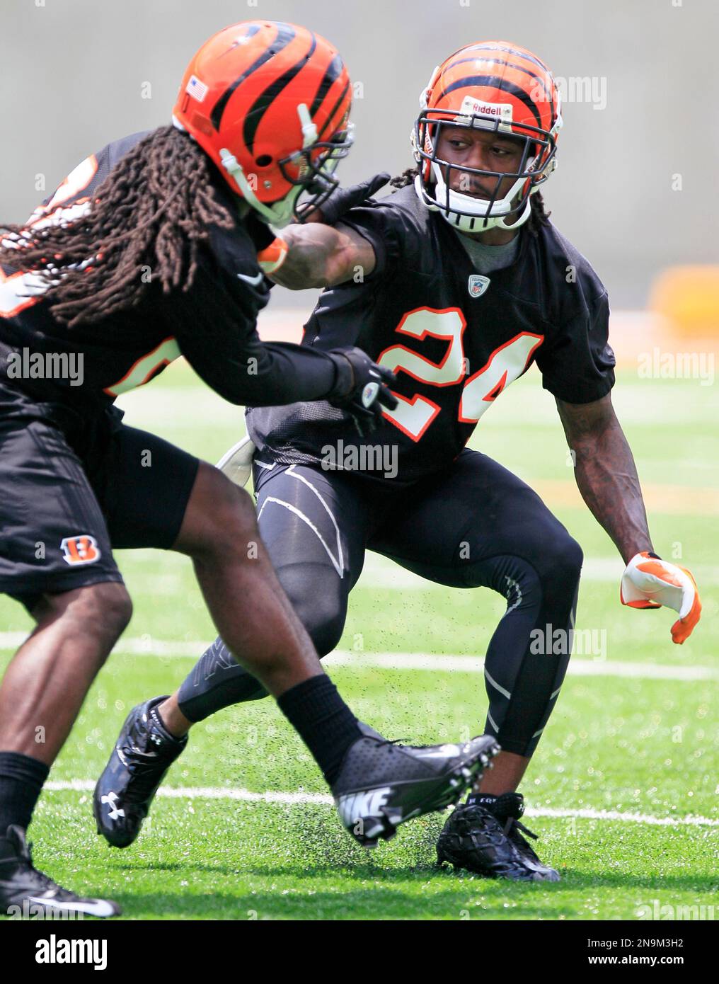 Cincinnati Bengals cornerback Adam Jones (24) pushes off safety Reggie ...