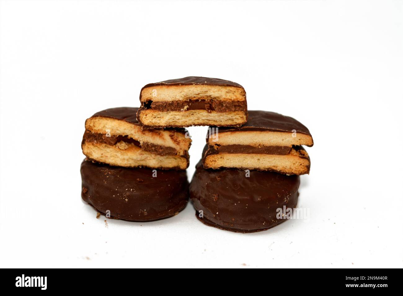 Biscuits filled and coated with natural chocolate, weight gain concept ...