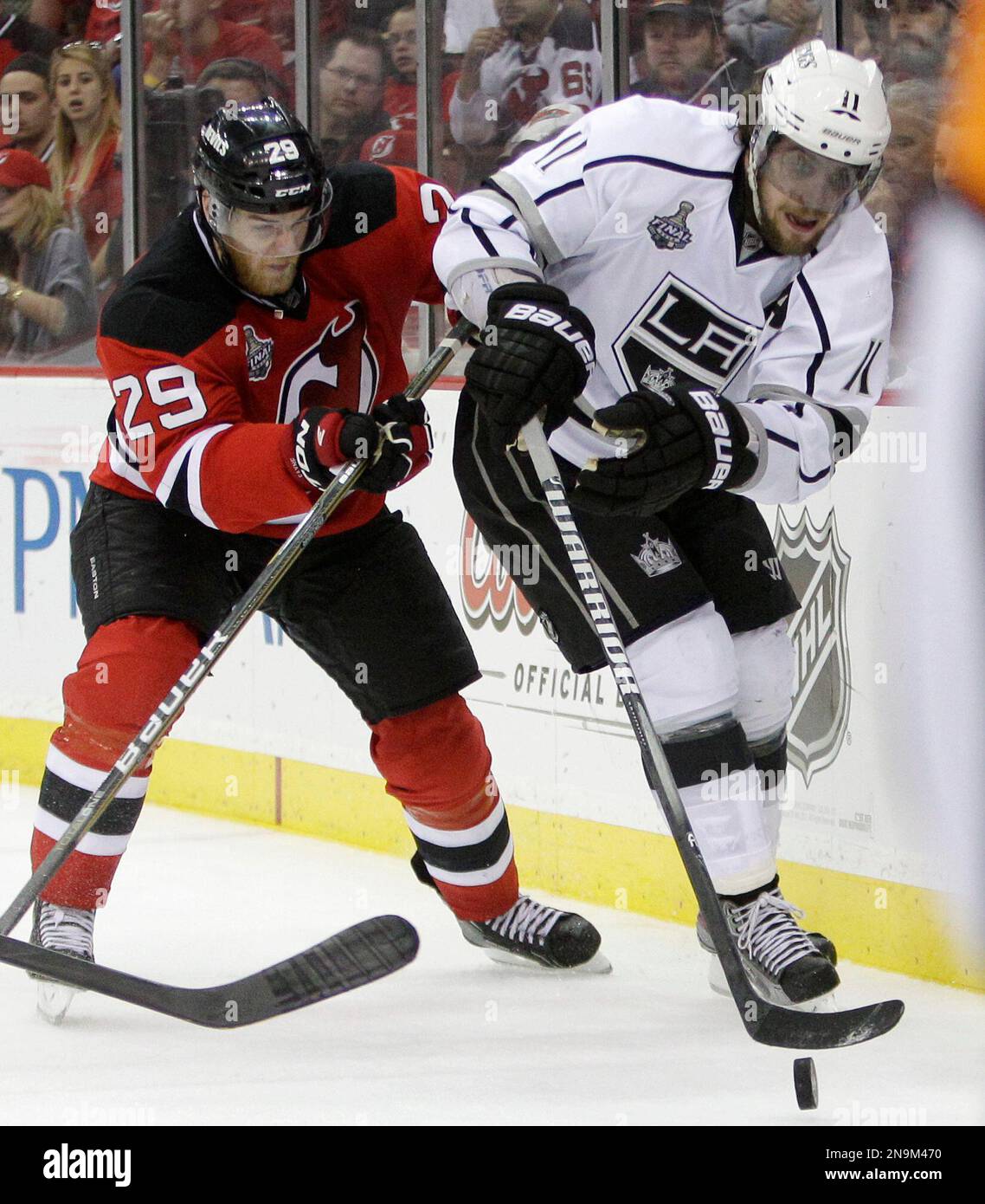 New Jersey Devils defenseman Mark Fayne (29) defends Los Angeles Kings ...