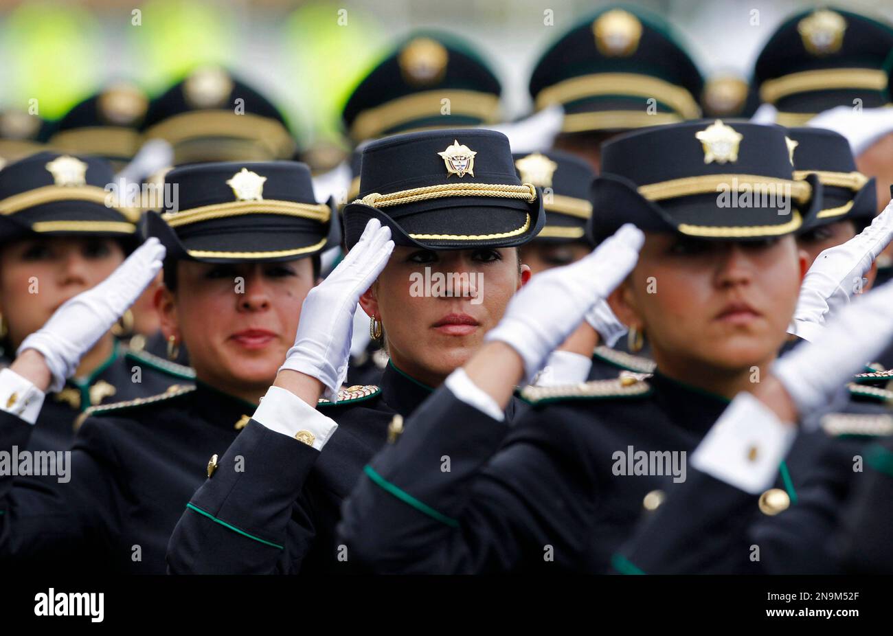 Female police officers parade after their graduation ceremony at the ...
