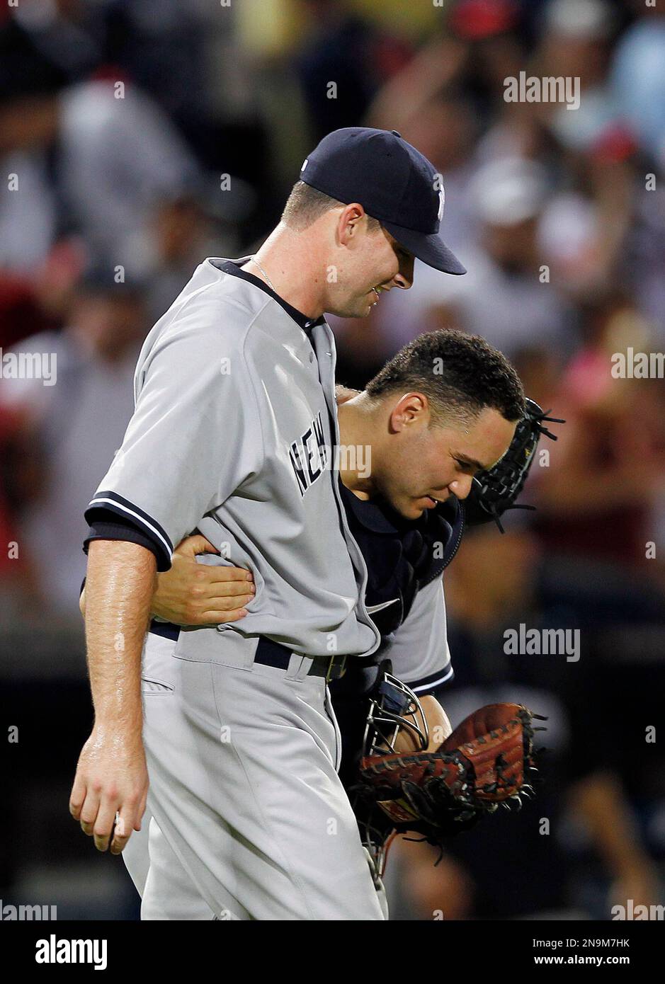 New York Yankees relief pitcher Boone Logan, left, and catcher Russell ...