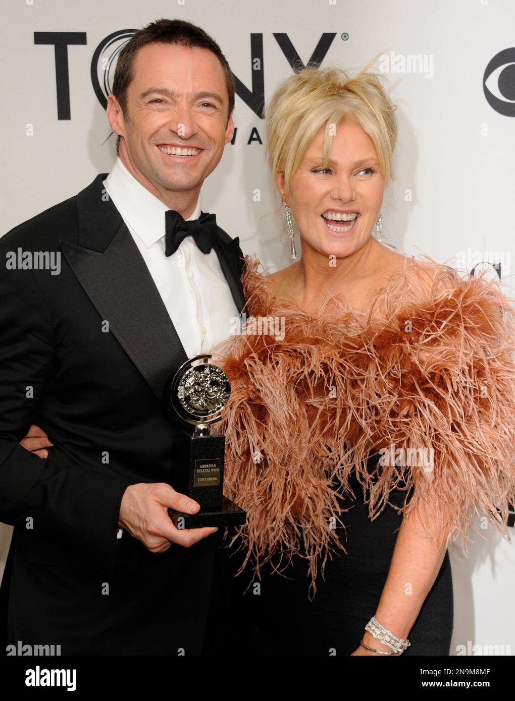 Actor Hugh Jackman poses with his wife Deborra-Lee Furness in the press ...