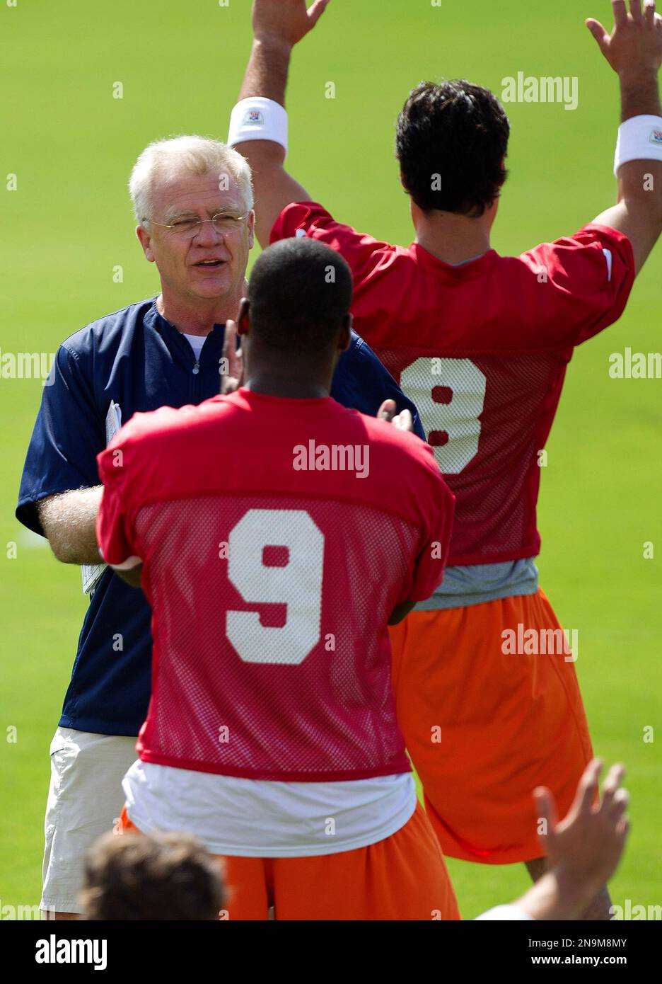 Miami Dolphins offensive coordinator Mike Sherman talks to quarterback ...