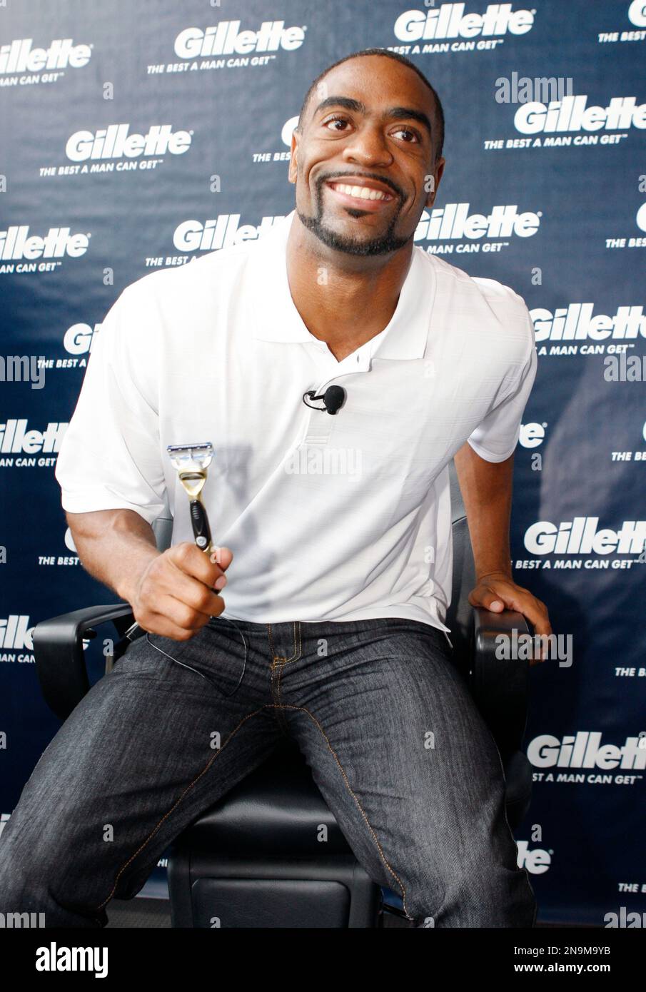 COMMERCIAL IMAGE - American 100m record holder Tyson Gay holds Gillette ...