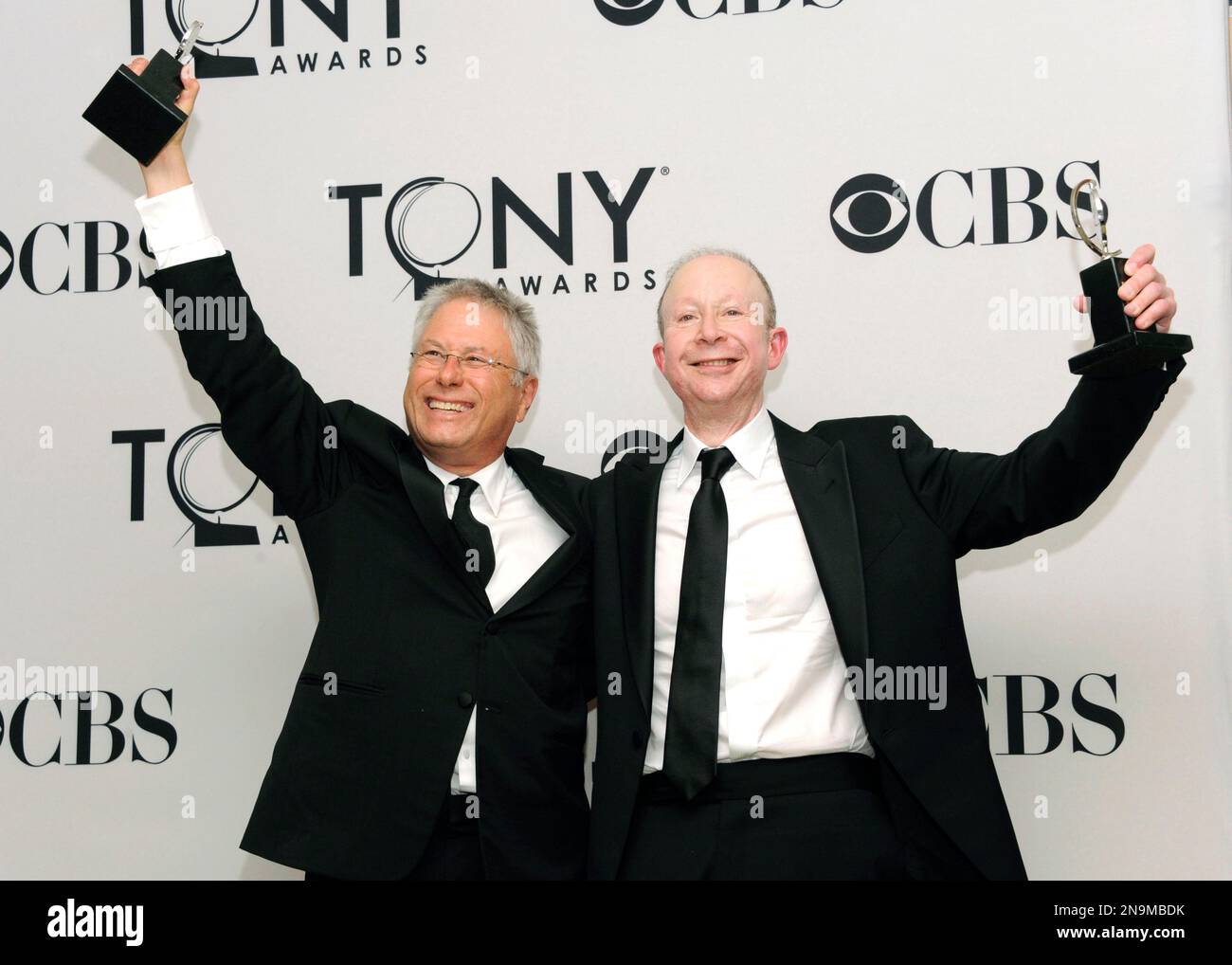 Alan Menken, left, and Jack Feldman pose in the press room at the 66th annual Tony Awards on ...